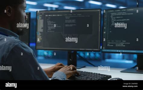 Technician Doing System Analysis Typing Data On Pc Doing Needed