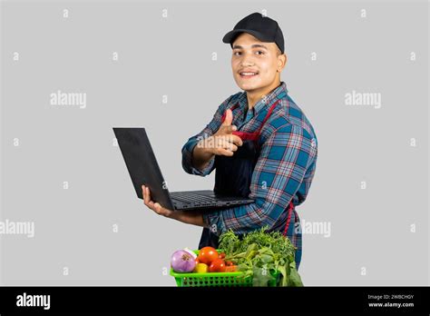 Young Entrepreneur Asian Vegetable Farmer Using Digital Technology