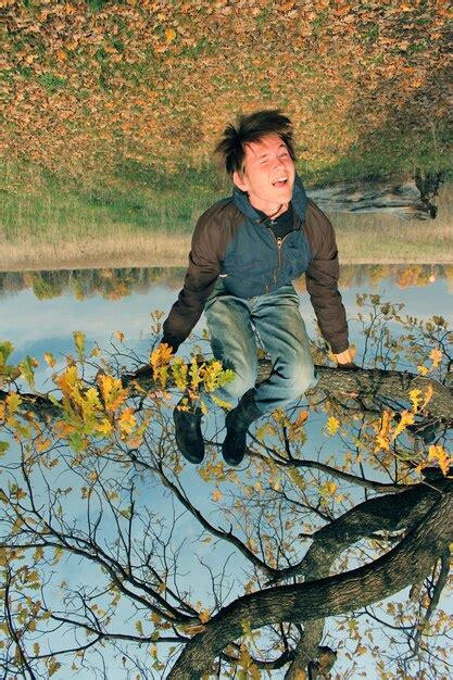 Premium Photo Portrait Of Man Hanging On Tree