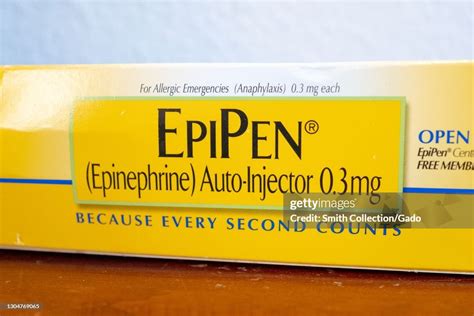 Close Up Of A Yellow Epipen Branded Epinephrine Autoinjector Box