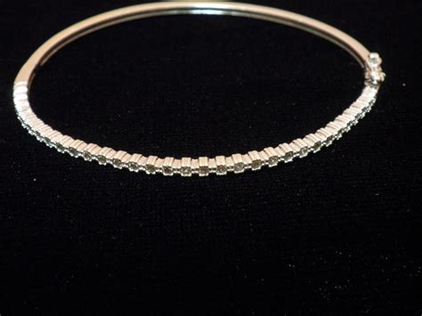 Златна твърда гривна с бели камъни Златна твърда гривна 648 гр