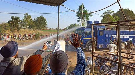 Police Use Tear Gas Water Cannons Trucks To Prevent Farmers From