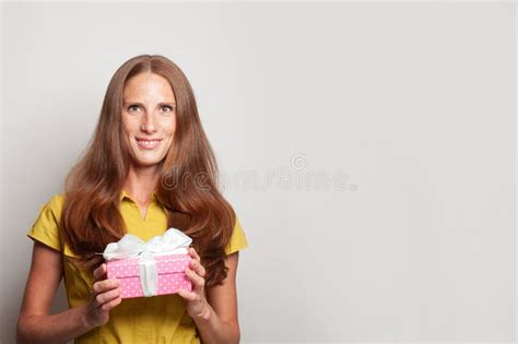 Perfect Redhead Model Woman With Long Ginger Hair Holding T Box With