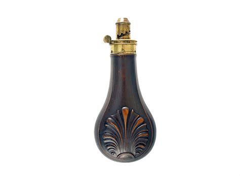 A Very Good Shell And Bush Powder Flask Garth Vincent