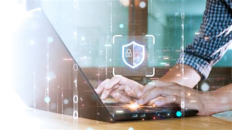 Hands Typing On A Laptop With A Digital Shield And Lock Icon Symbolizing Cybersecurity