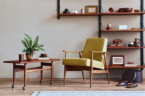 디자인 안락 의자 나무 책장 커피 테이블 사진 프레임 식물 카펫 슬리퍼 장식 및 가정 장식의 우아한 액세서리복고풍 거실