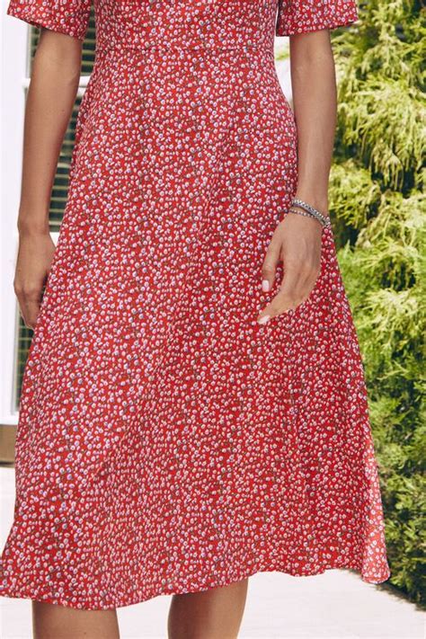 Сукня з спідницею трапеція міді софт дрібноцвіт на червоному Vovk