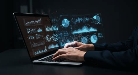 A Person Is Typing On A Laptop Displaying Digital Analytics And Data Visualization Stock