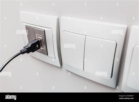 Electric Power Socket With USB Cord And Switch In Room Stock Photo Alamy