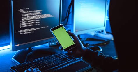 Premium Photo A Male Hacker Is Using A Computer To Hack Data To Demand Ransom From Victims