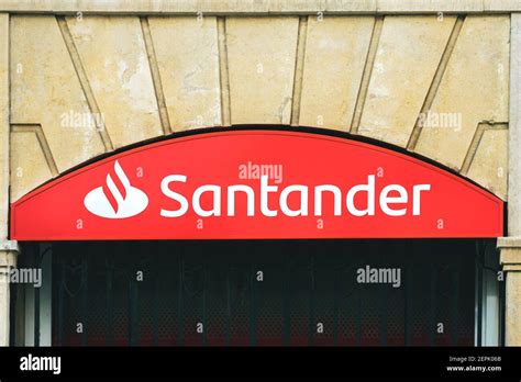 Santander Bank Sign Logo Of Branch Office In The City Exterior View Of Santander Bank Branch
