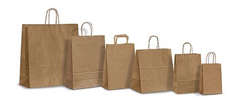 Паперові бурі крафт пакети з ручками — Готові крафтові пакети купити у Києві ціна фотографії