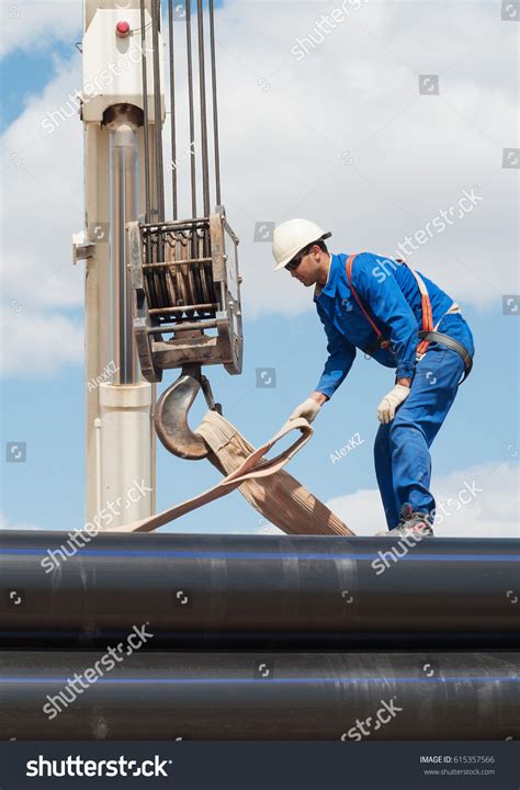 Work On Unloading Pipes Construction Crane Stock Photo 615357566 Shutterstock