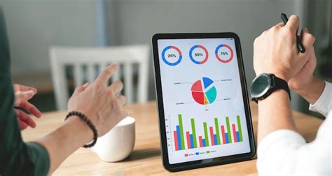 Premium Photo Group Of Business People Analyzing Data Using Computer