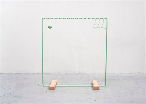 Wave Shaped Clothes Rails Keep Items Evenly Spaced