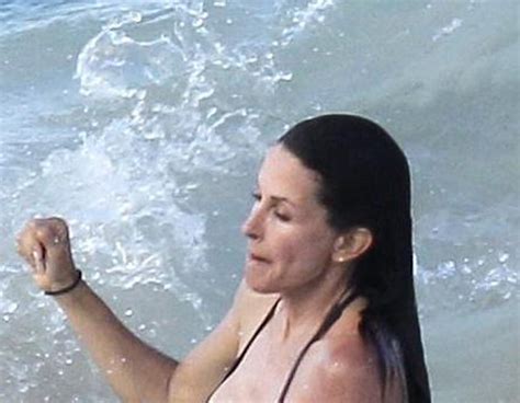 Courteney Cox From Guess The Celeb Bikini Wardrobe Malfunction E News