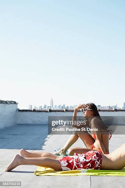 Female Rooftop Sunbathing Photos And Premium High Res Pictures Getty