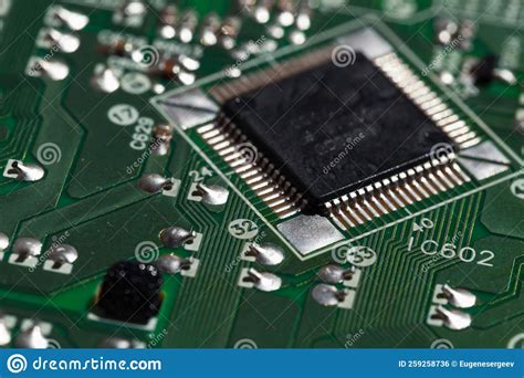 Microchip Mounted On A Green Printed Circuit Board Stock Photo Image Of Abstract Electrical