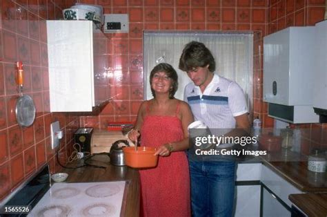 Glenn Hoddle Of Tottenham Hotspur And England Helps His Wife In The