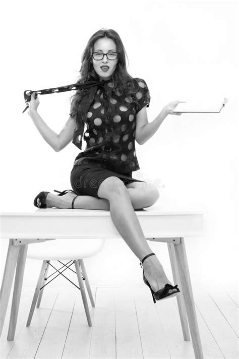 Full Length Of Woman Teacher At Table Woman Teacher In Office Stock