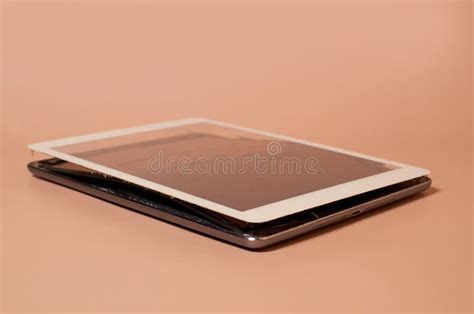 A Broken Tablet With A Swollen Battery And A Dirty Screen Stock Image Image Of Broken Bloated