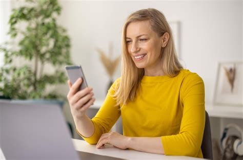 Premium Photo Attractive Woman With Blond Hair Having