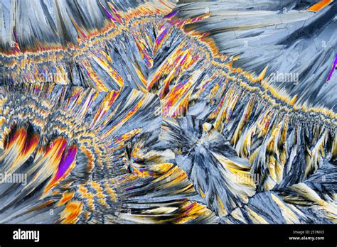 Microscopic View Of Colorful Sucrose Crystals Recrystallized Table