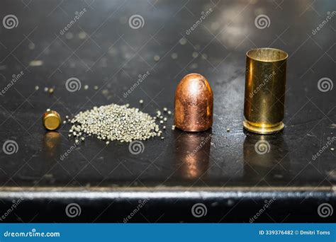 Disassembled Pistol 45 Caliber Cartridge Bullet Case Gunpowder And