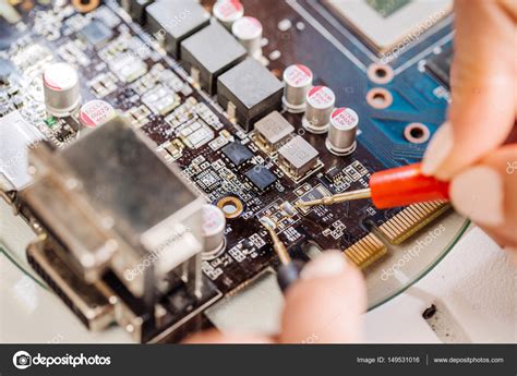 Woman Repairing Computer Hardware In Service Center Stock Photo Kaninstudio 149531016