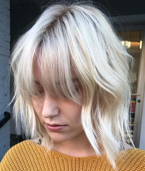 20 Best Wispy Layered Blonde Haircuts With Bangs