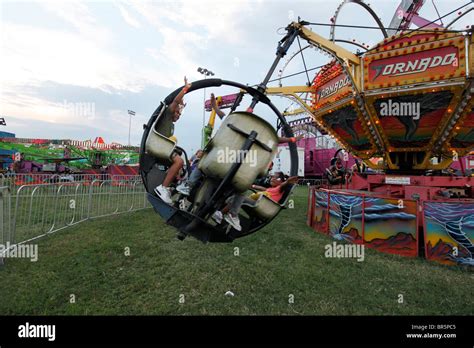 Spinning Carnival Ride Tornado At Dusk In Cape Girardeau Missouri