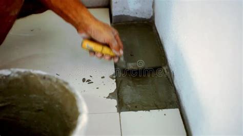 Laying Of Ceramic Tiles At The Construction Site Stock Footage Video