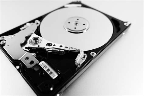 Premium Photo Computer Hard Drive With Top Cover Removed Disassembled