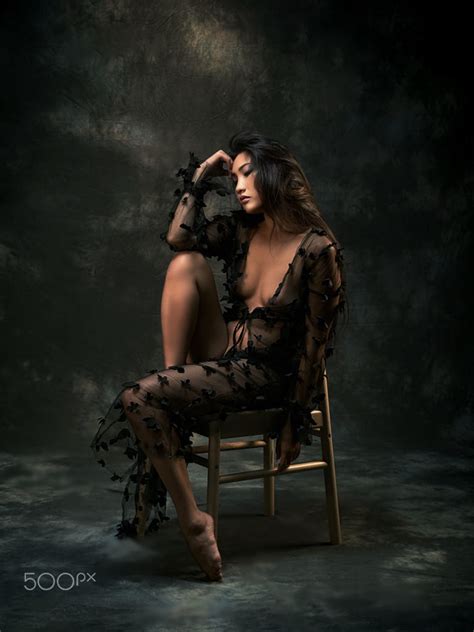 Woman In Sheer Fabric Posing With Introspective Grace People Photo By