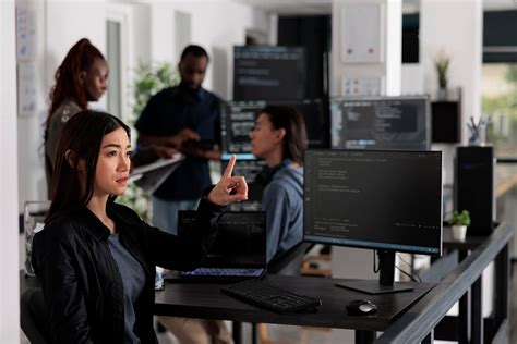 premium photo concentrated web developer working with hologram and