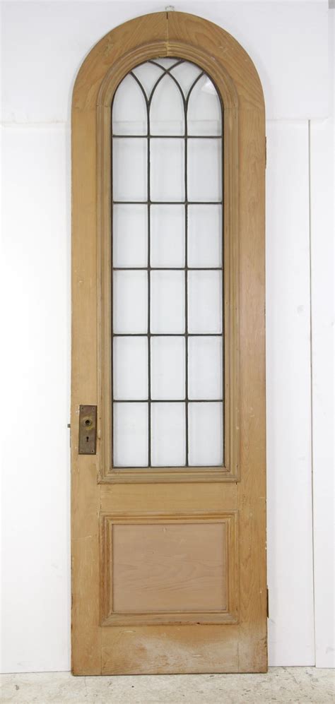 Arch Wood Door With 21 Leaded Glass Windows Bottom Panel For Sale At