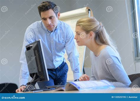 Male And Female It Programmers Testing New Software Application Stock