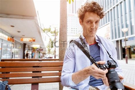 男摄影师拍照高清摄影大图 千库网