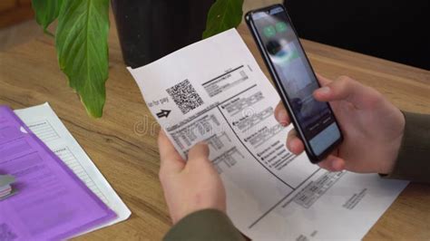 QR Utility Bill Mobile Bill Payment With QR Codes A Woman Scanning The QR Code With App And