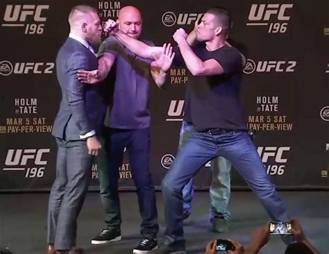 Conor Mcgregor And Nate Diaz Nearly Came To Blows At Ufc 196 Press Conference Maxim