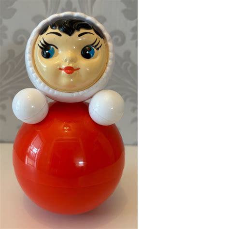 Vintage Roly Poly Doll With Red Body