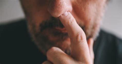 Person Picking Their Nose