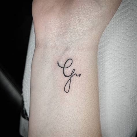 100 Initial Tattoos Perfect For Proclaiming Your Love For Your Partner Initial Wrist Tattoos
