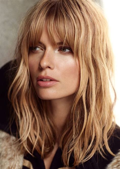 Medium Length Wavy Haircuts With Bangs