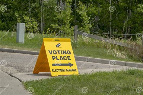 Side View To A Voting Place Elections Alberta Sign Yellow Double Sided