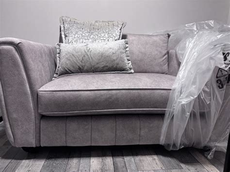 Dfs Cherished Formal Back Cuddler Sofa In Oatmeal Colour Sofalistic