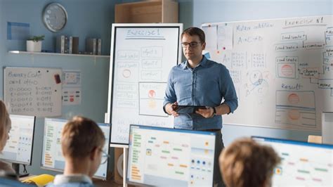 Premium Photo Elementary School Class Teacher Uses Interactive