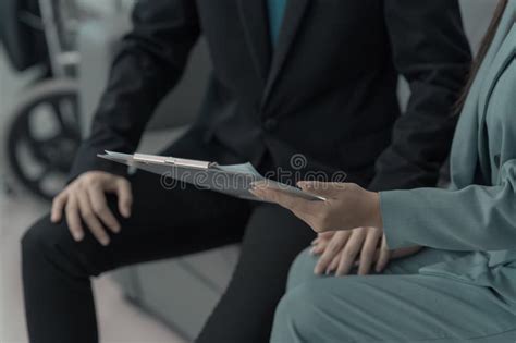 A Woman Who Felt Scared After Being Touched By Her Manager While Working In The Office Stock