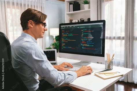 It Developer Working Online Software Development Information On Pc And Laptop Screen With Typing