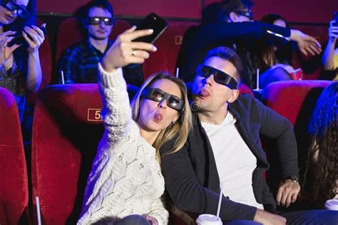 Beautiful Girl And Guy Laughing Happily Making A Selfie Together During